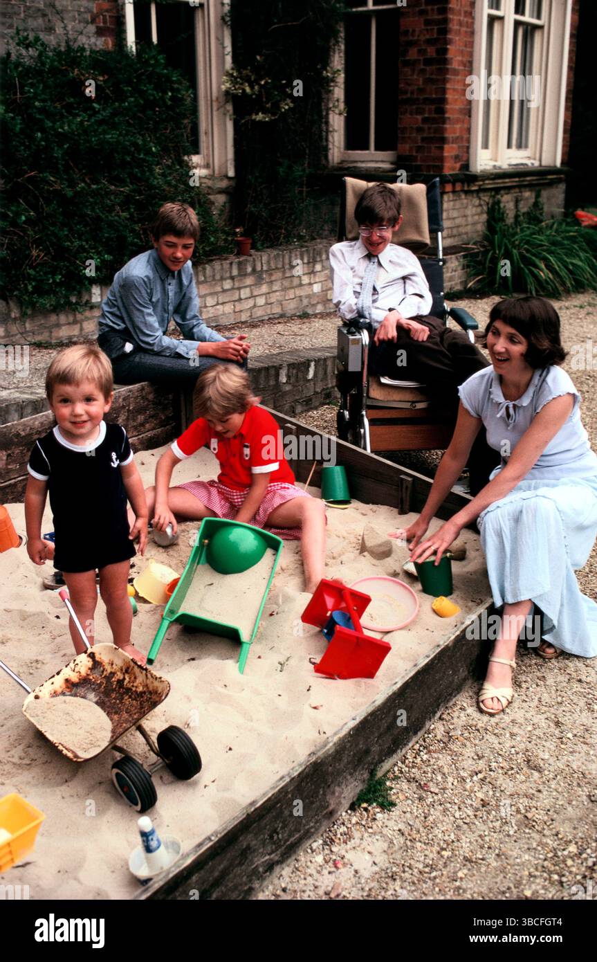 Professor Stephen Hawking with young family. children playing in a ...
