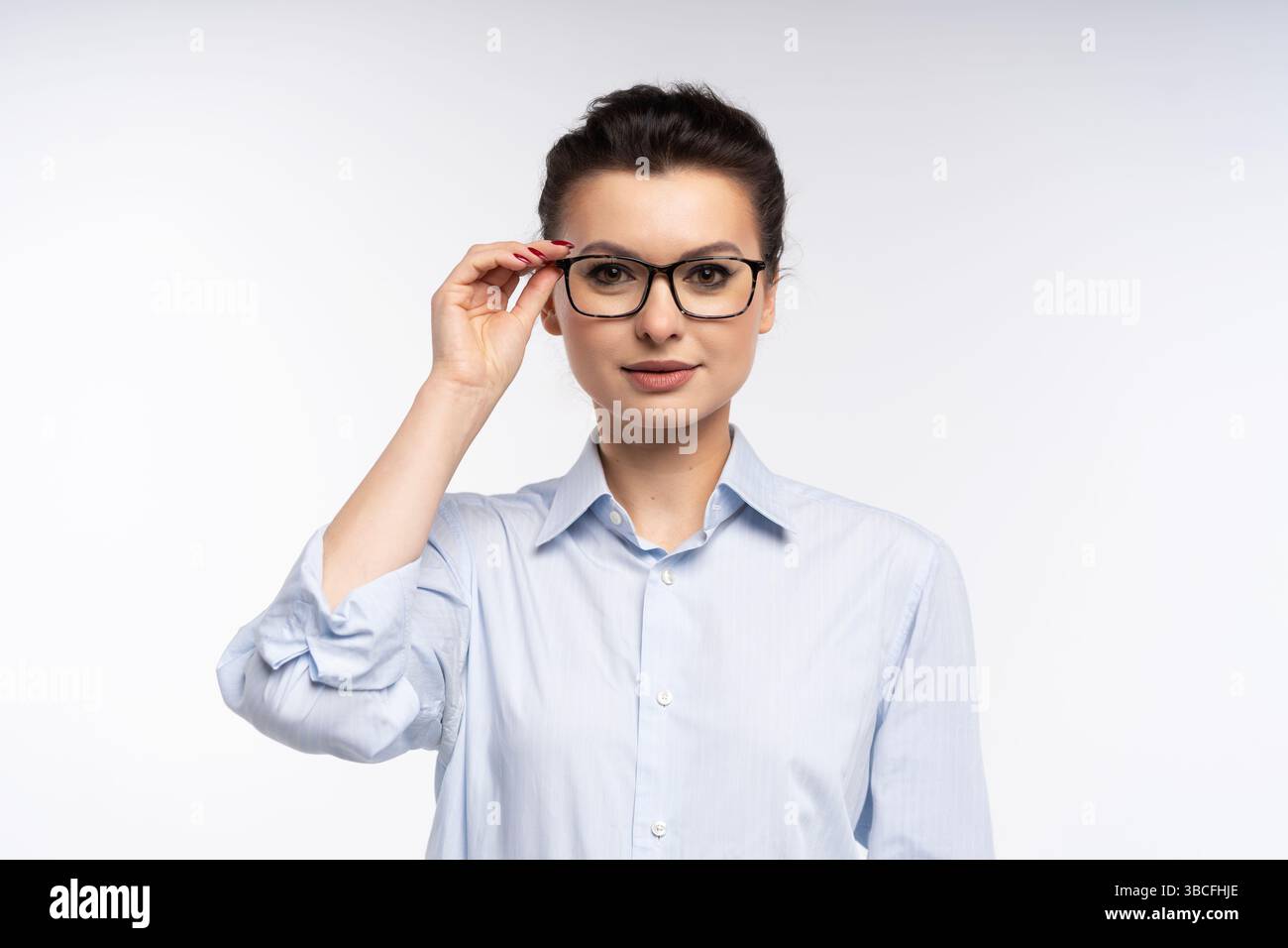 Photo of pretty businesswoman wearing eyeglasses standing in the office ...