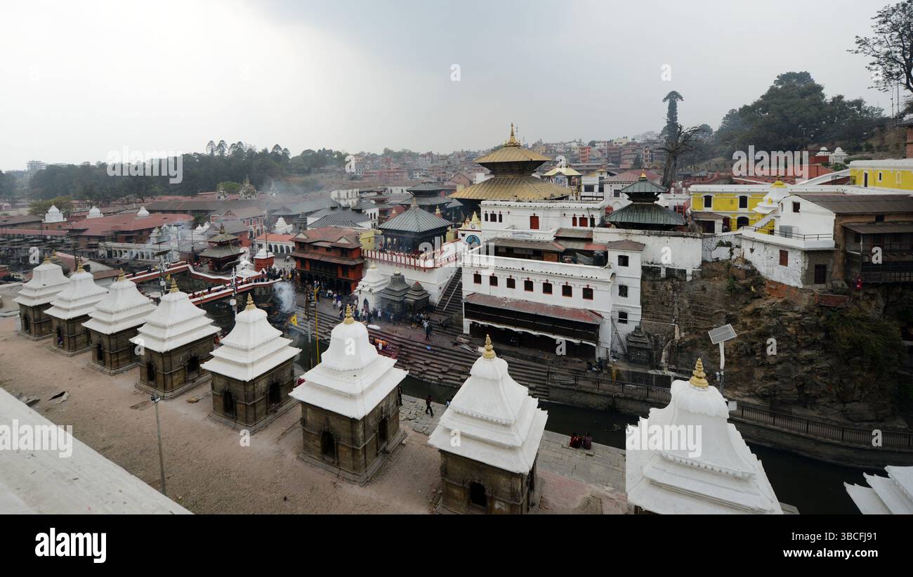 The Pashupatinath temple featuring the main temple's eastern gate, mini ...