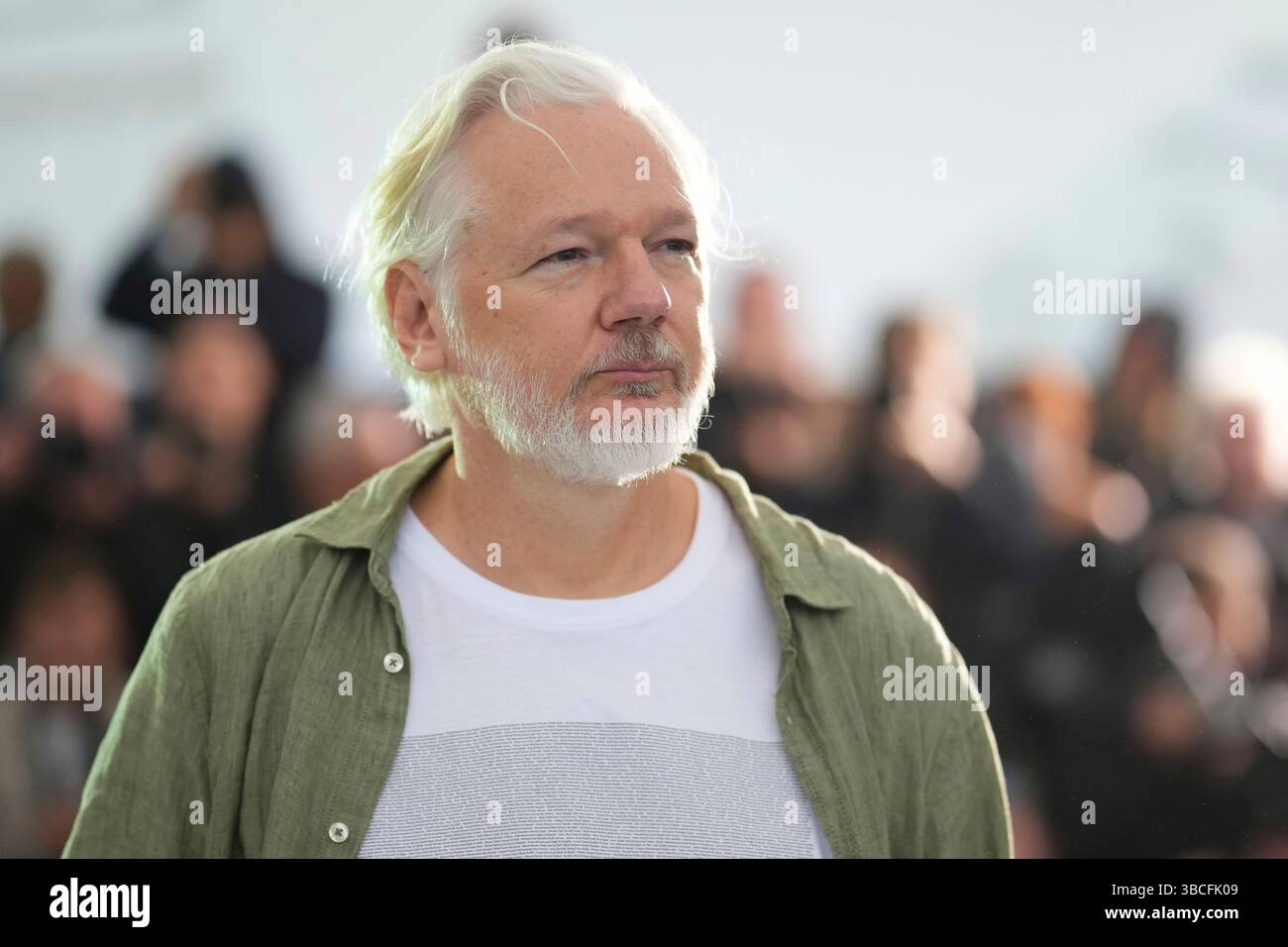 Julian Assange poses for photographers at the photo call for the film ...