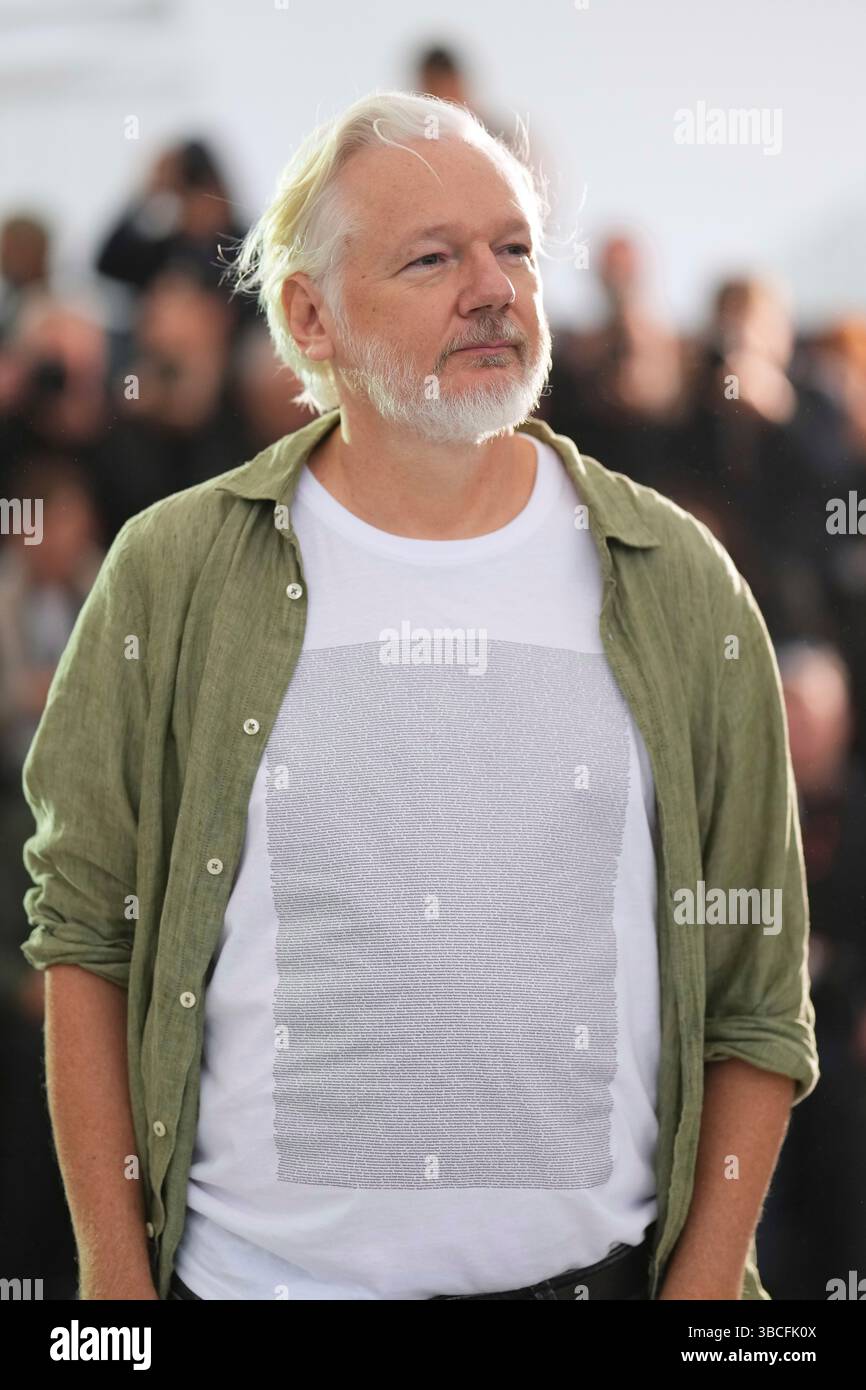 Julian Assange poses for photographers at the photo call for the film ...