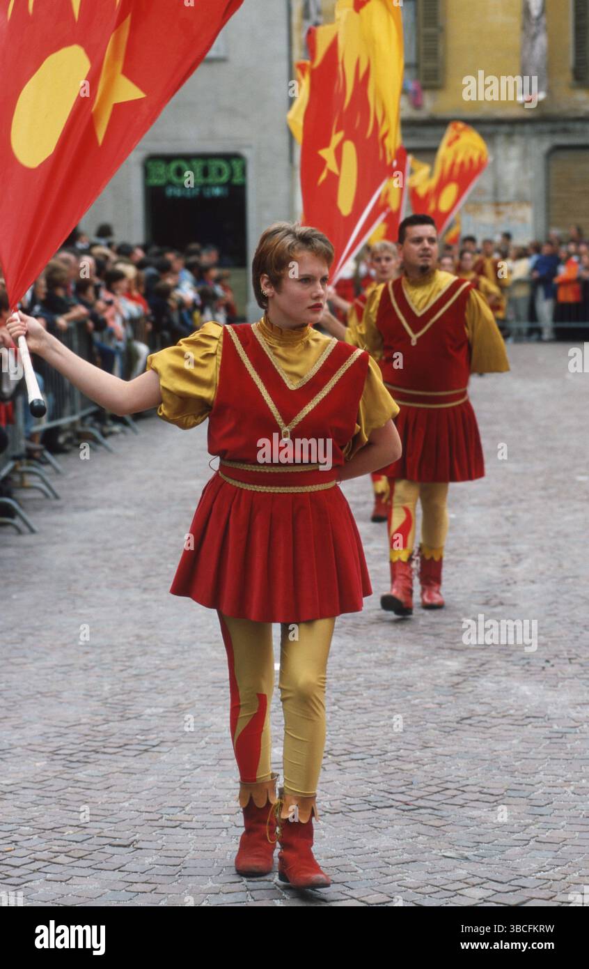 Standard bearer in traditional clothes, Palio parade, Alba, Piemonte ...