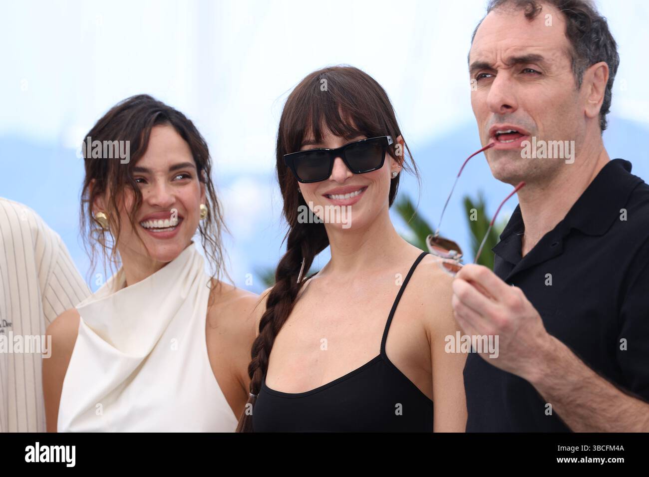 Adria Arjona, Dakota Johnson and Michael Angelo Covino attend the ...