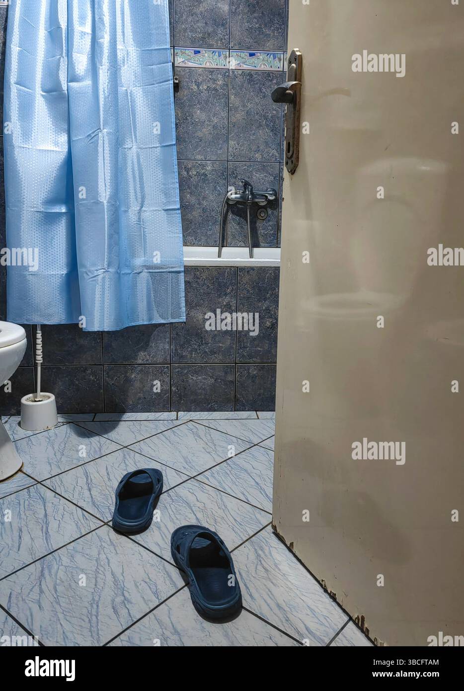 Entering the Bathroom – Daily Ritual Scene Stock Photo - Alamy