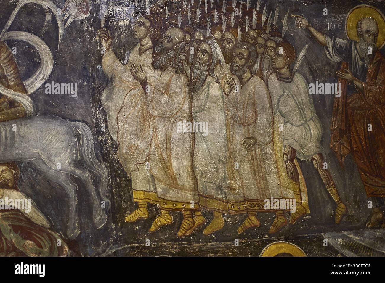 A group of saints in fresco, all in procession, showing religious ...