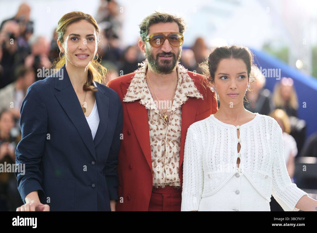 Zineb Triki, from left, Fares Fares and Lyna Khoudri pose for ...
