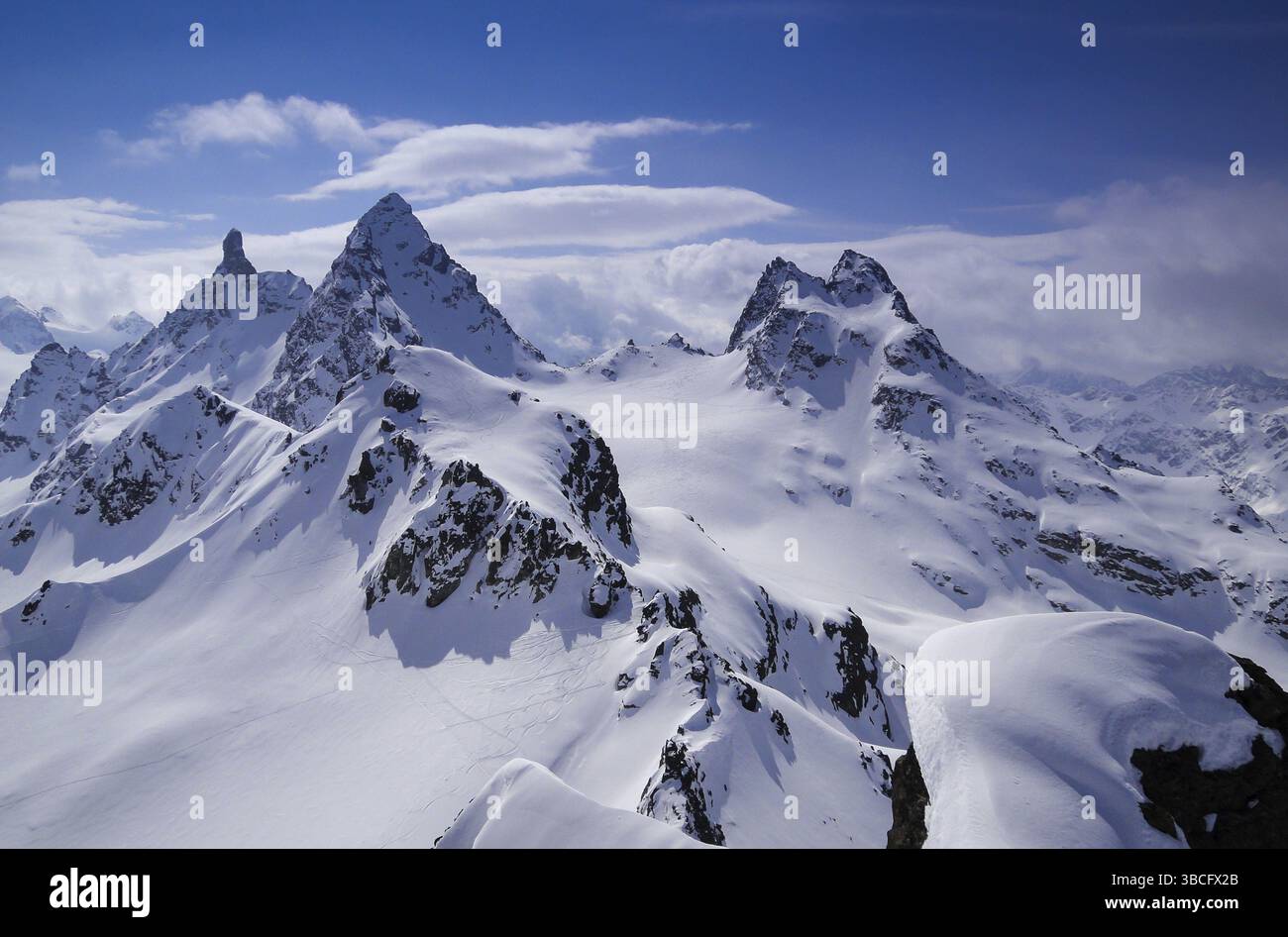 gorgeous mountain landscape in deep winter with impressive peaks in the ...
