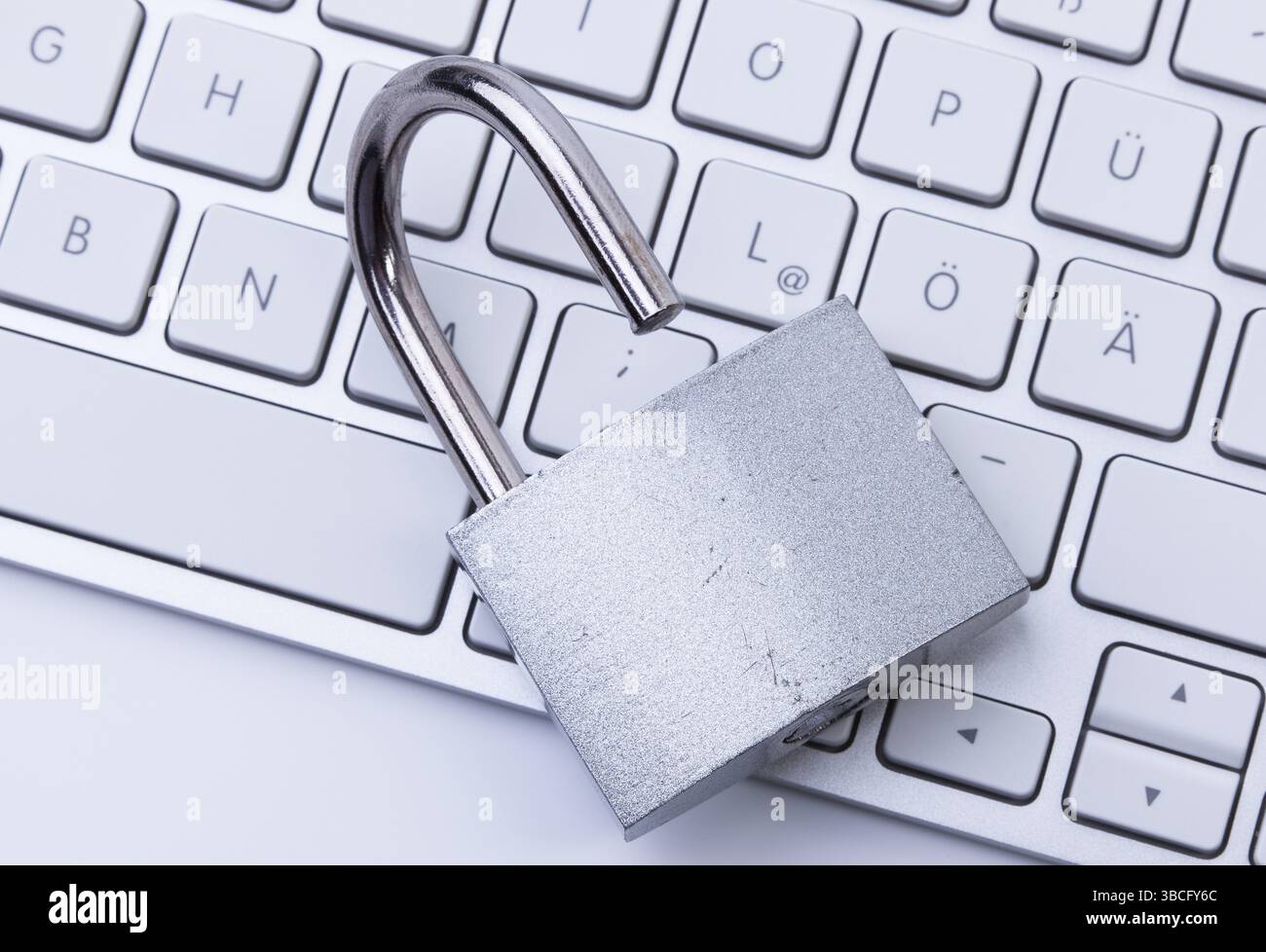 Photo shows a keypad and an open padlock Stock Photo - Alamy