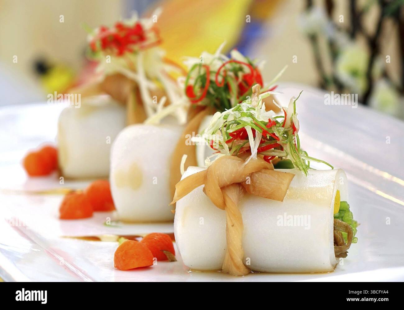 A traditional Chinese Hakka dish made from broad rice noodles and ...