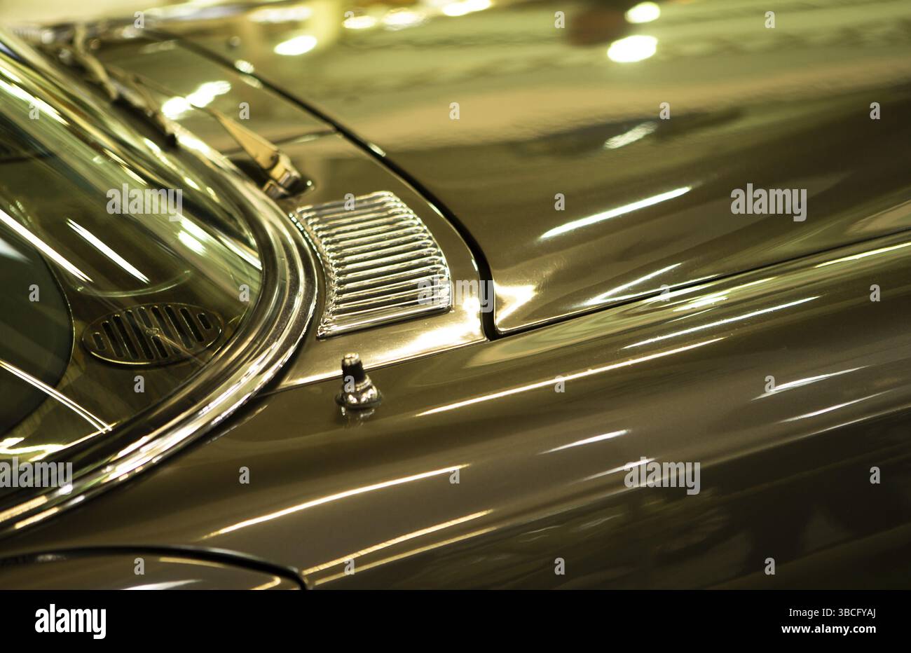 The photo shows a detailed view of a gleaming classic car Stock Photo ...
