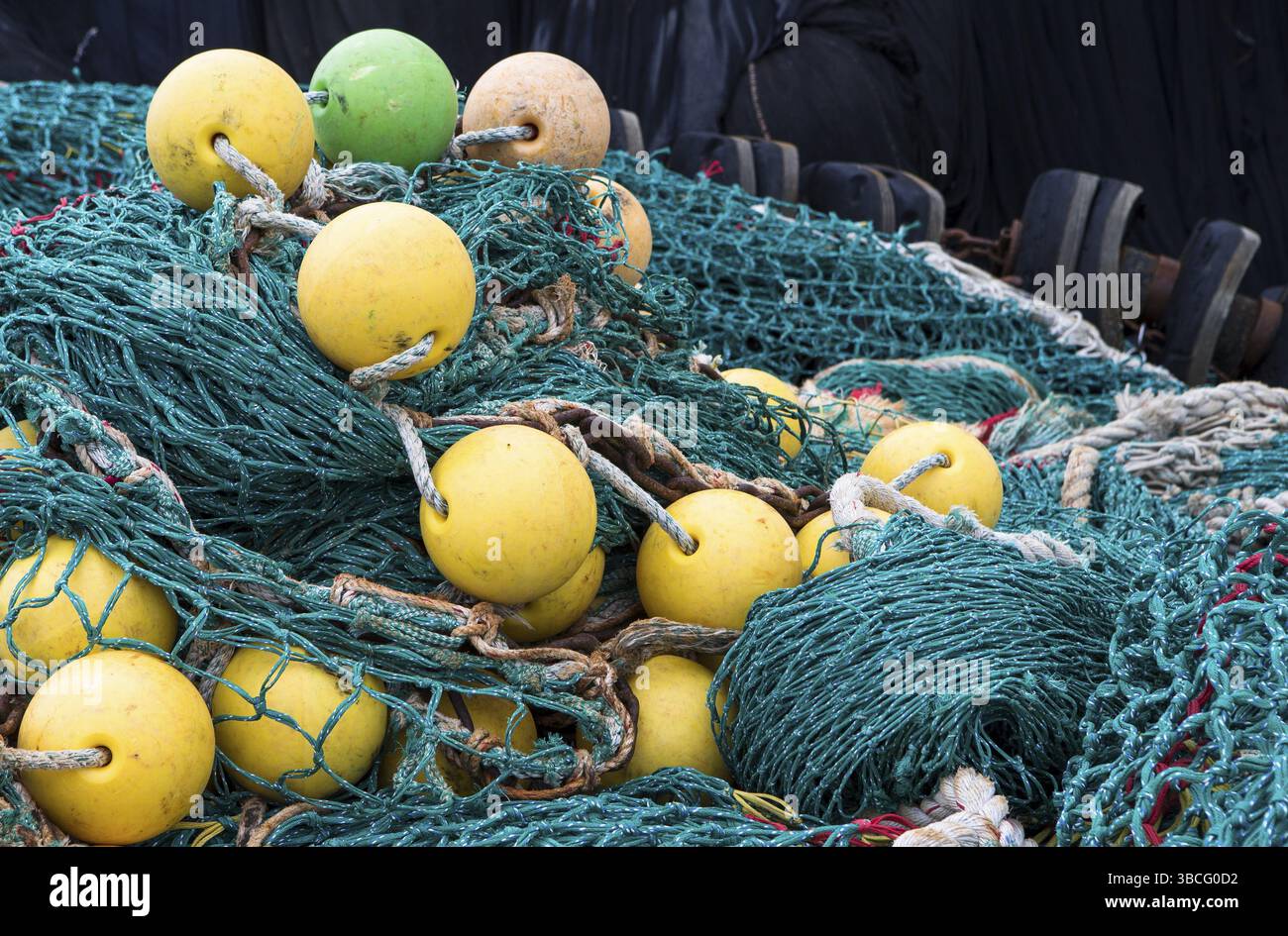 The photo shows a pile of fishing nets with floats Stock Photo - Alamy