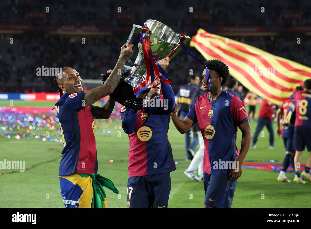 Barcelona, Spain. 18th, May 2025. Raphinha (11), Marc Casado (17) and ...