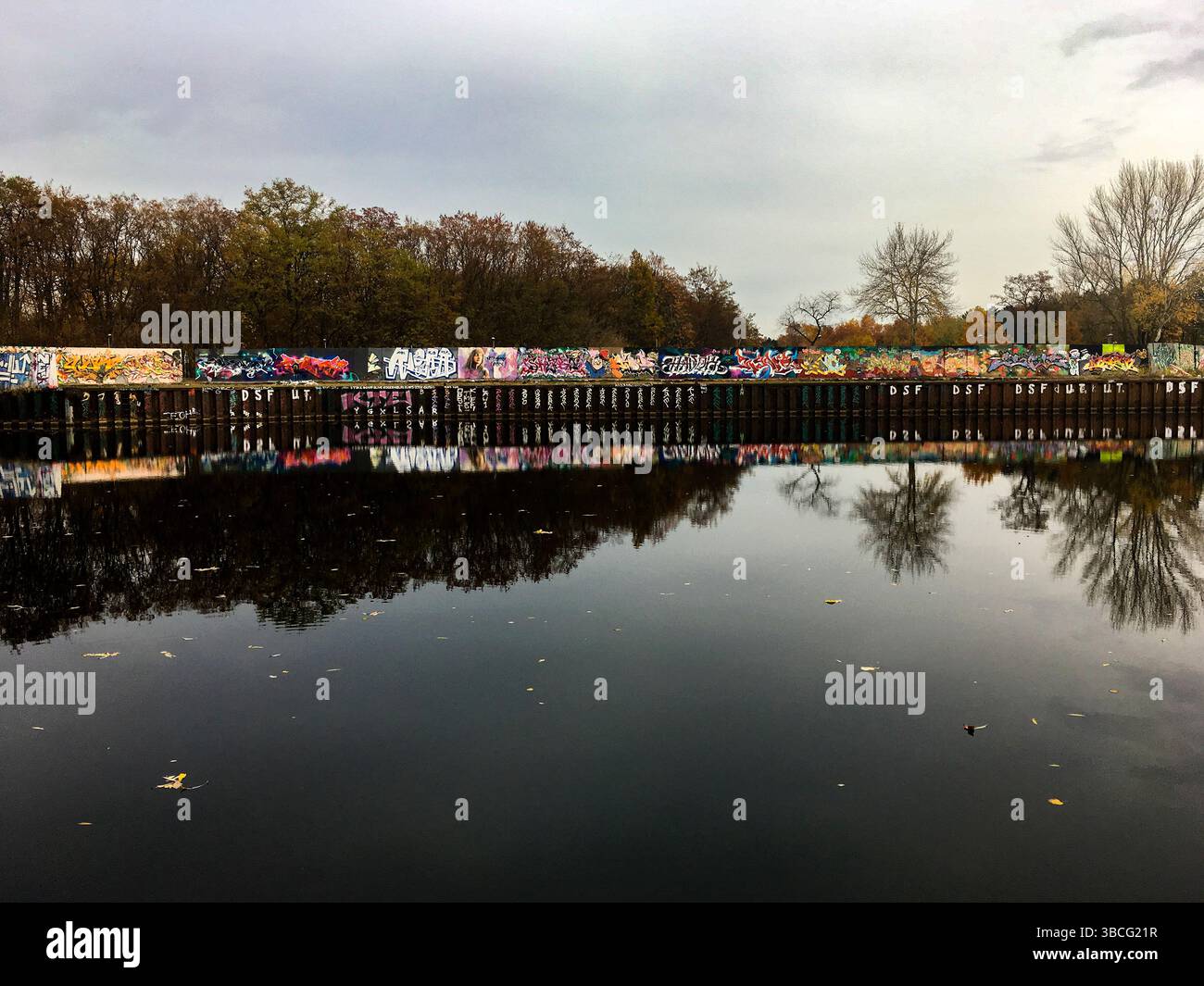 Old parts of the Berlin Wall stored years ago, on an abandoned industrial estate lot, where they ...