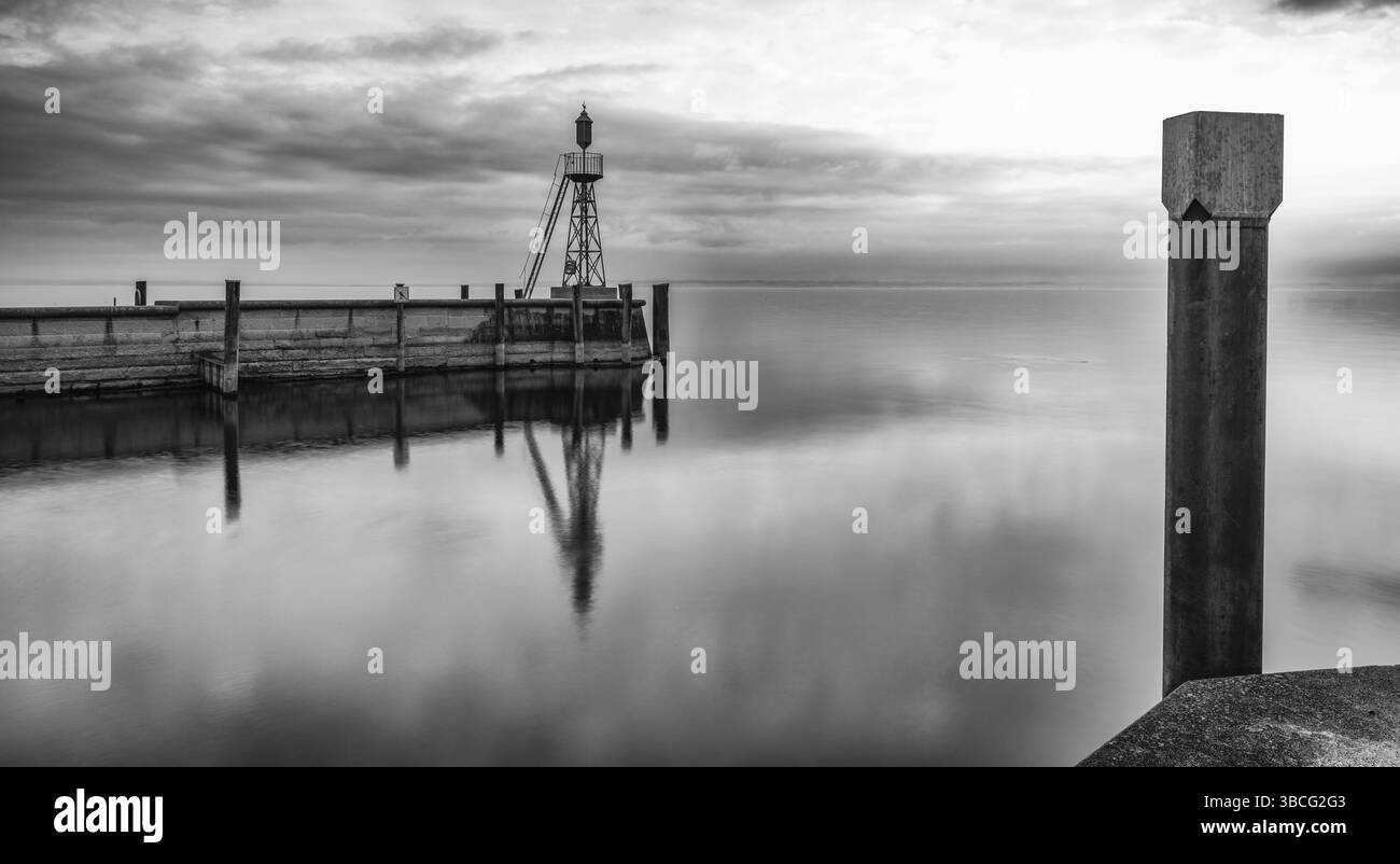 The harbor jetty at Rorschach harbor on a typical April spring morning ...