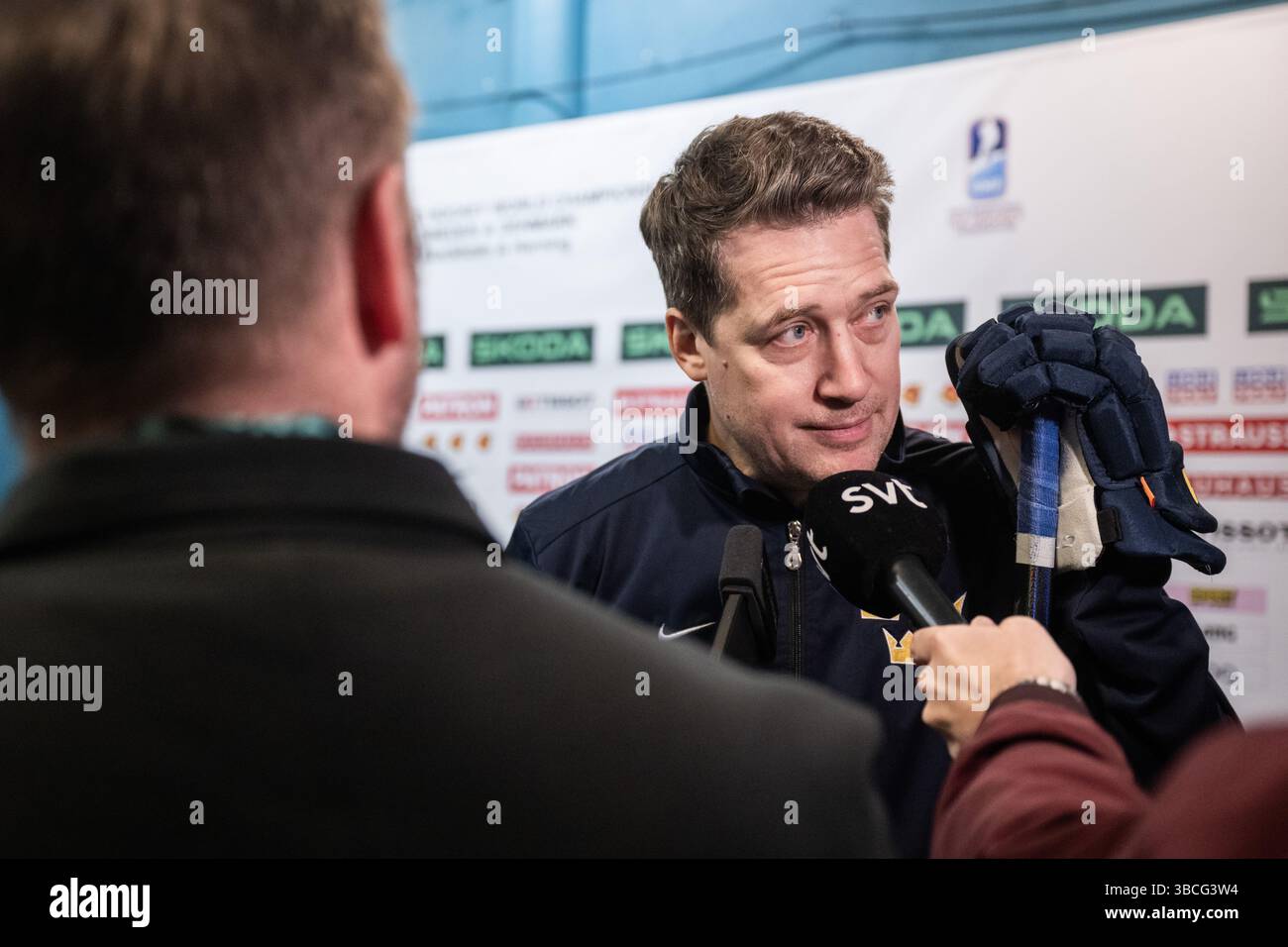 coach Sam Hallam of, Sweden. , . in the mixed zone after a practice ...