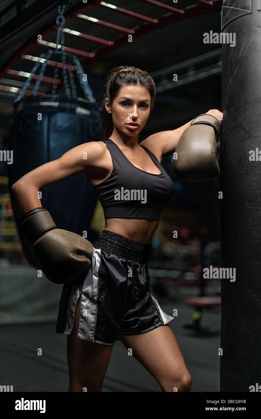 fit athlete showcases strength and determination while wearing boxing ...