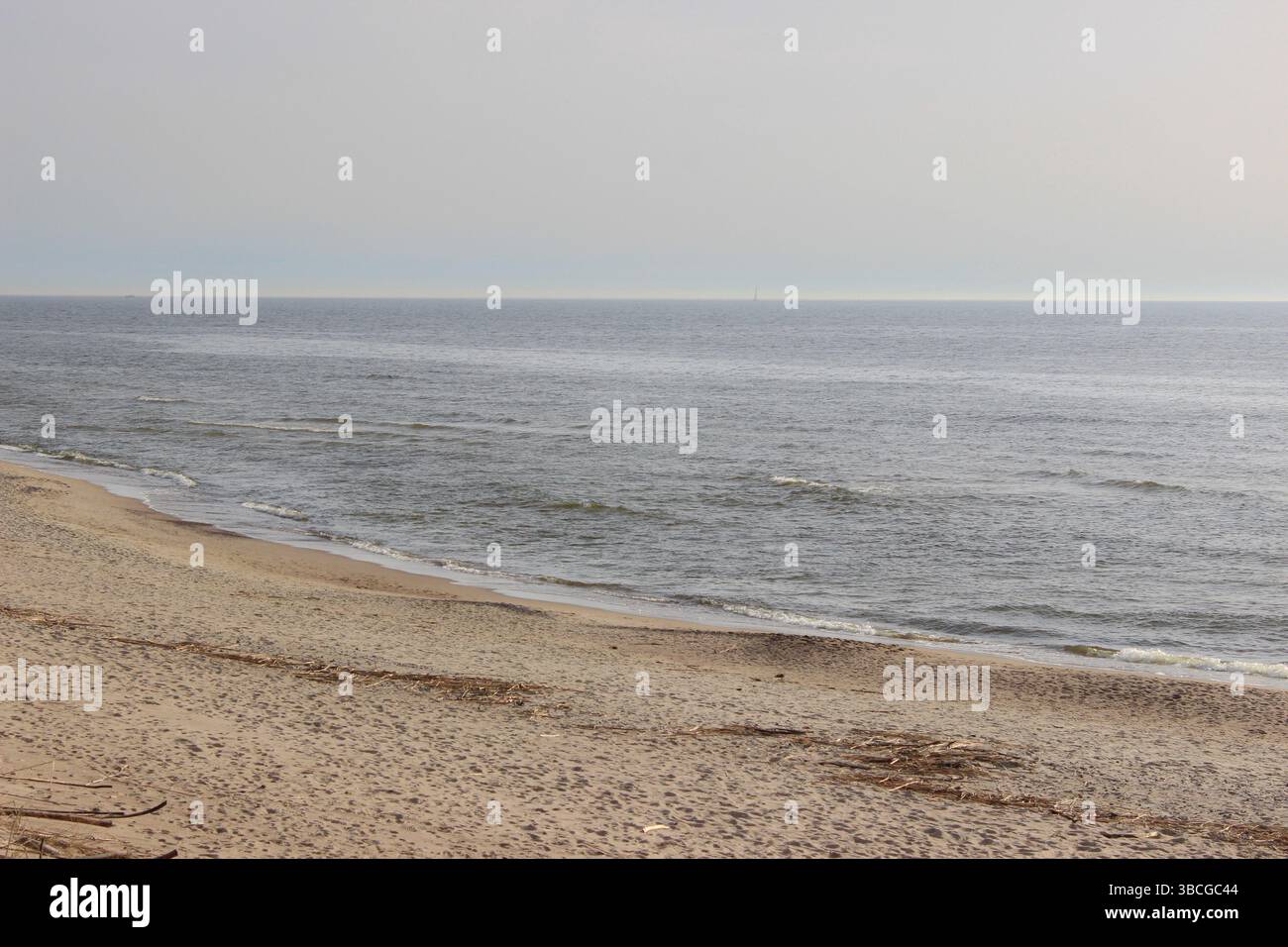 Serene empty beach gentle waves hi-res stock photography and images - Alamy