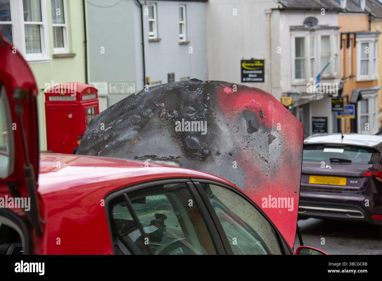 Red VW car fire burnt Stock Photo - Alamy