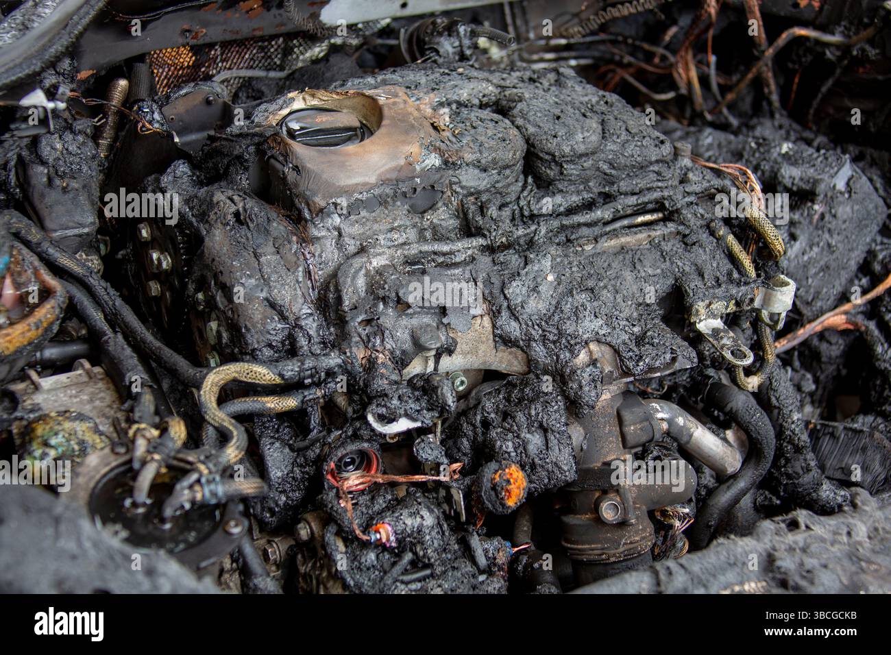 Red VW car fire burnt Stock Photo - Alamy