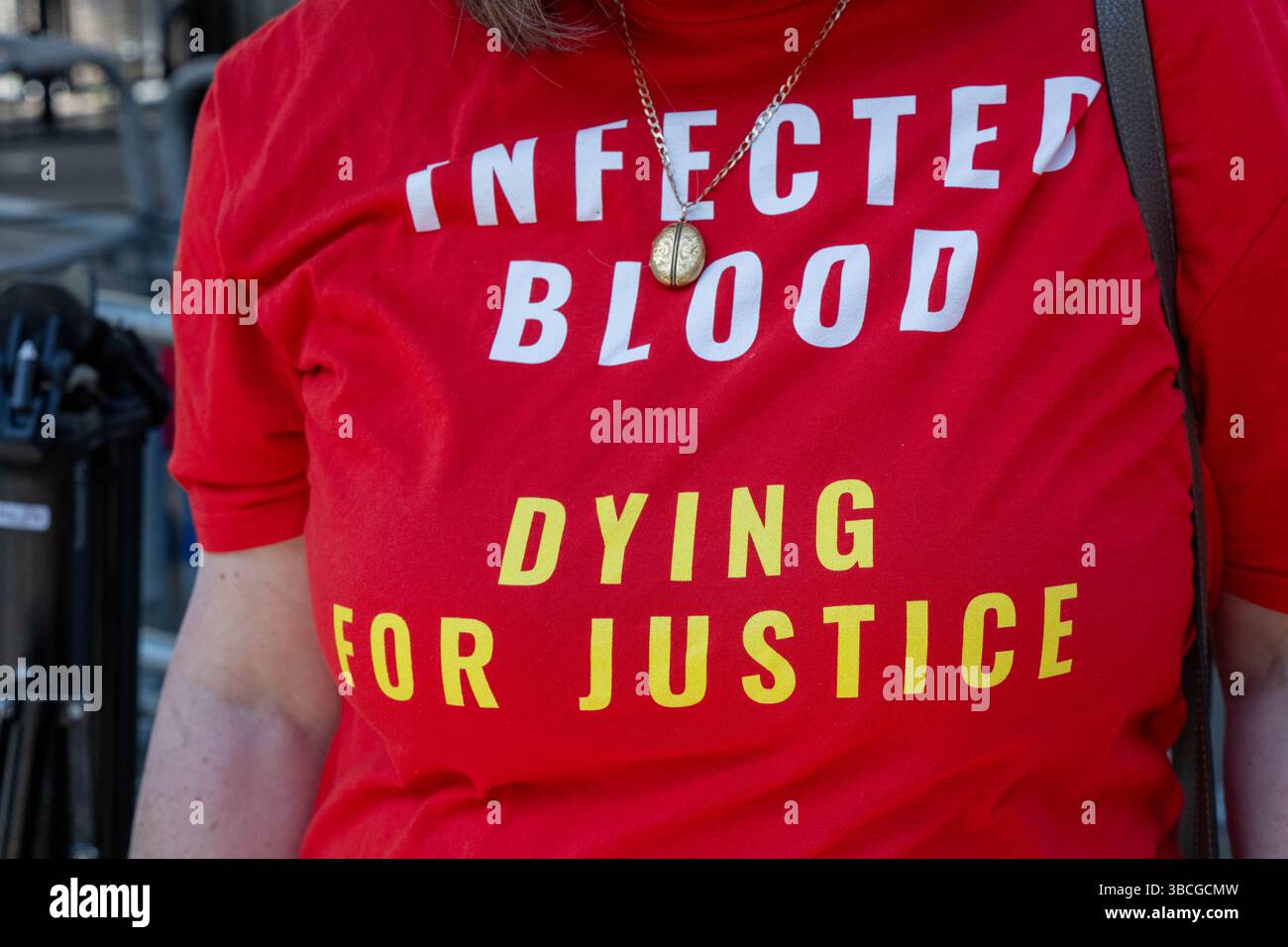London, UK. 20th May, 2025. Infected blood campaigners protest outside ...