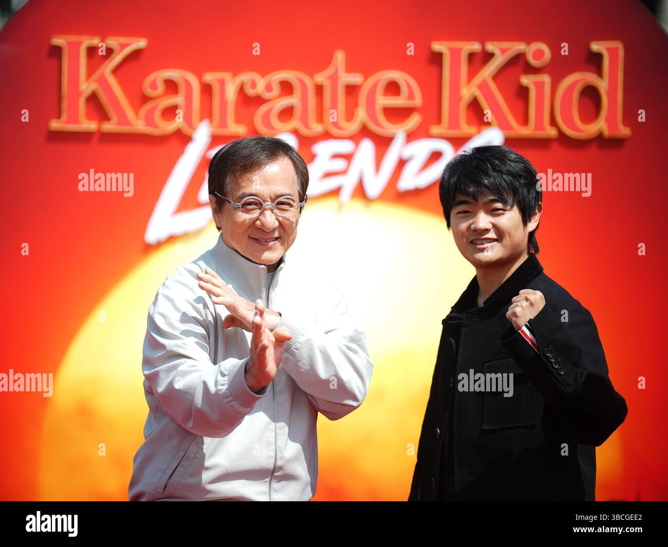 Jackie Chan (left) and Ben Wang attend a photocall for Karate Kids ...