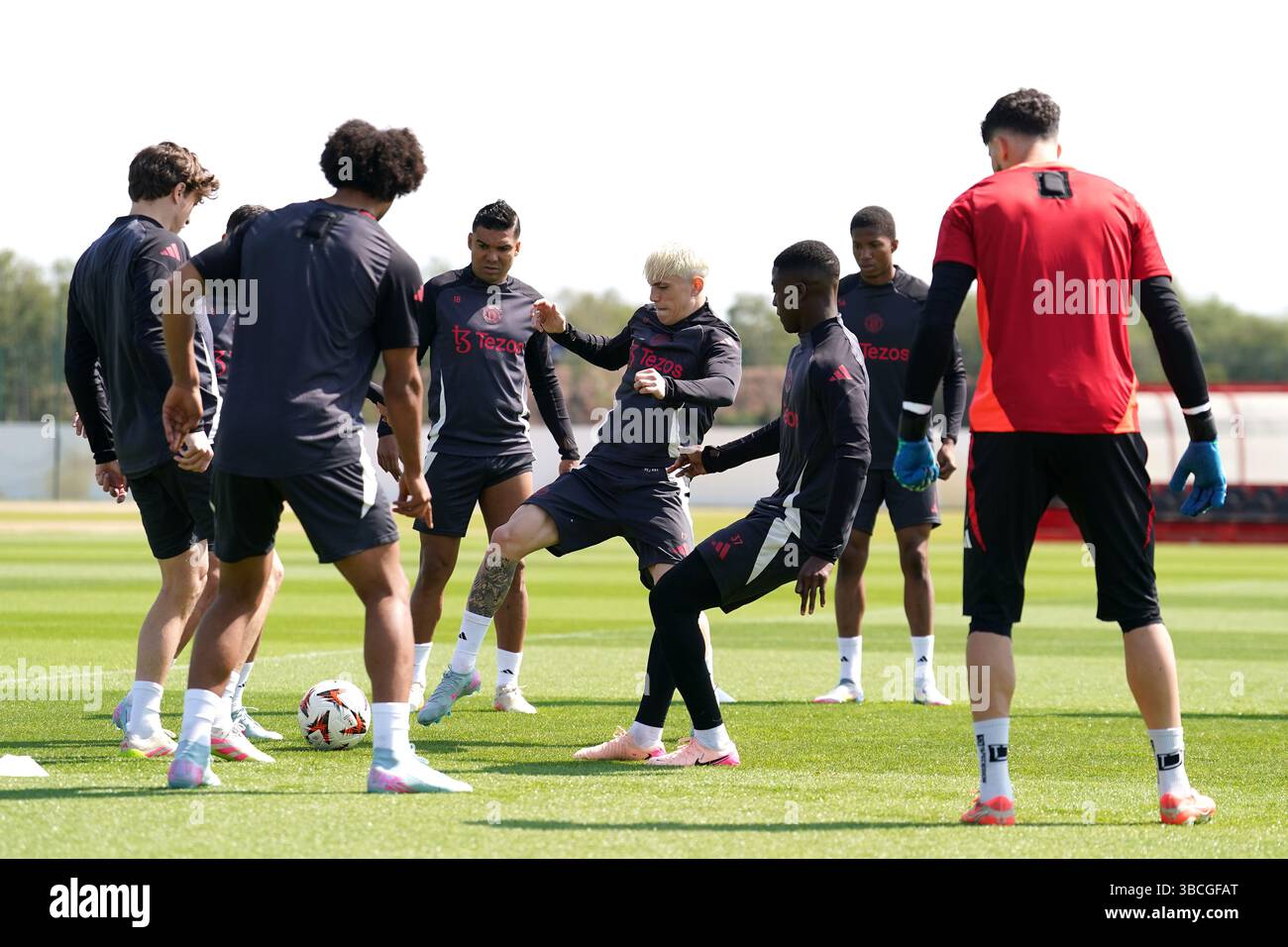 Manchester United's Alejandro Garnacho (centre) and team-mates during a ...