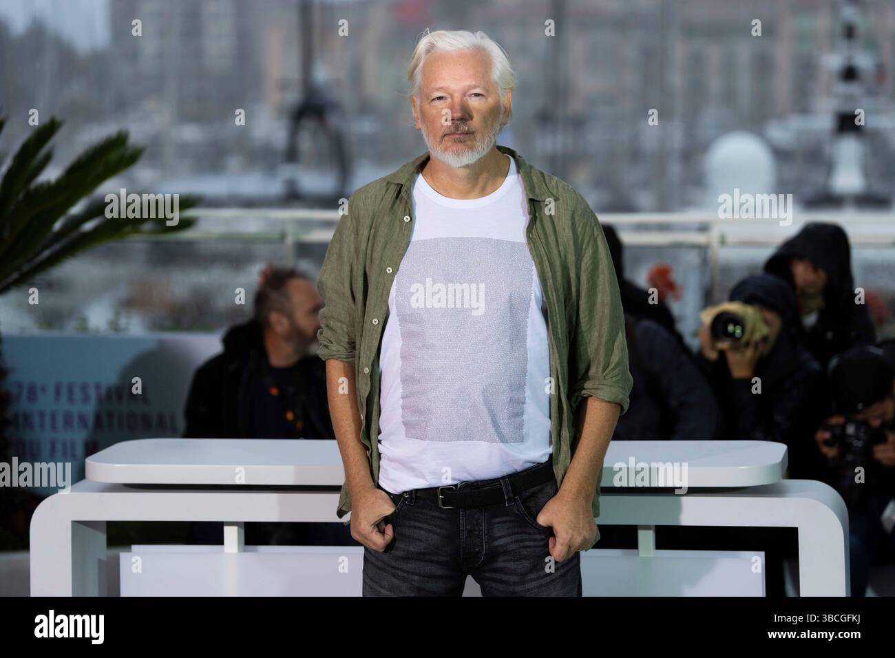 Julian Assange poses for photographers at the photo call for the film ...