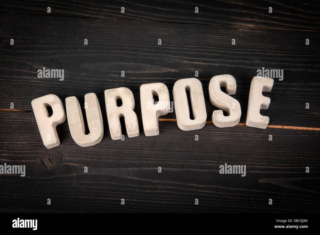 Purpose Word Made of Concrete Letters on Dark Wooden Background for ...