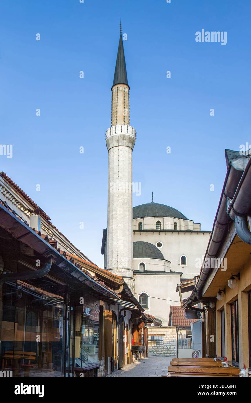 Traditional street view of Gazi Husrev-Beg Mosque and cafes in a ...