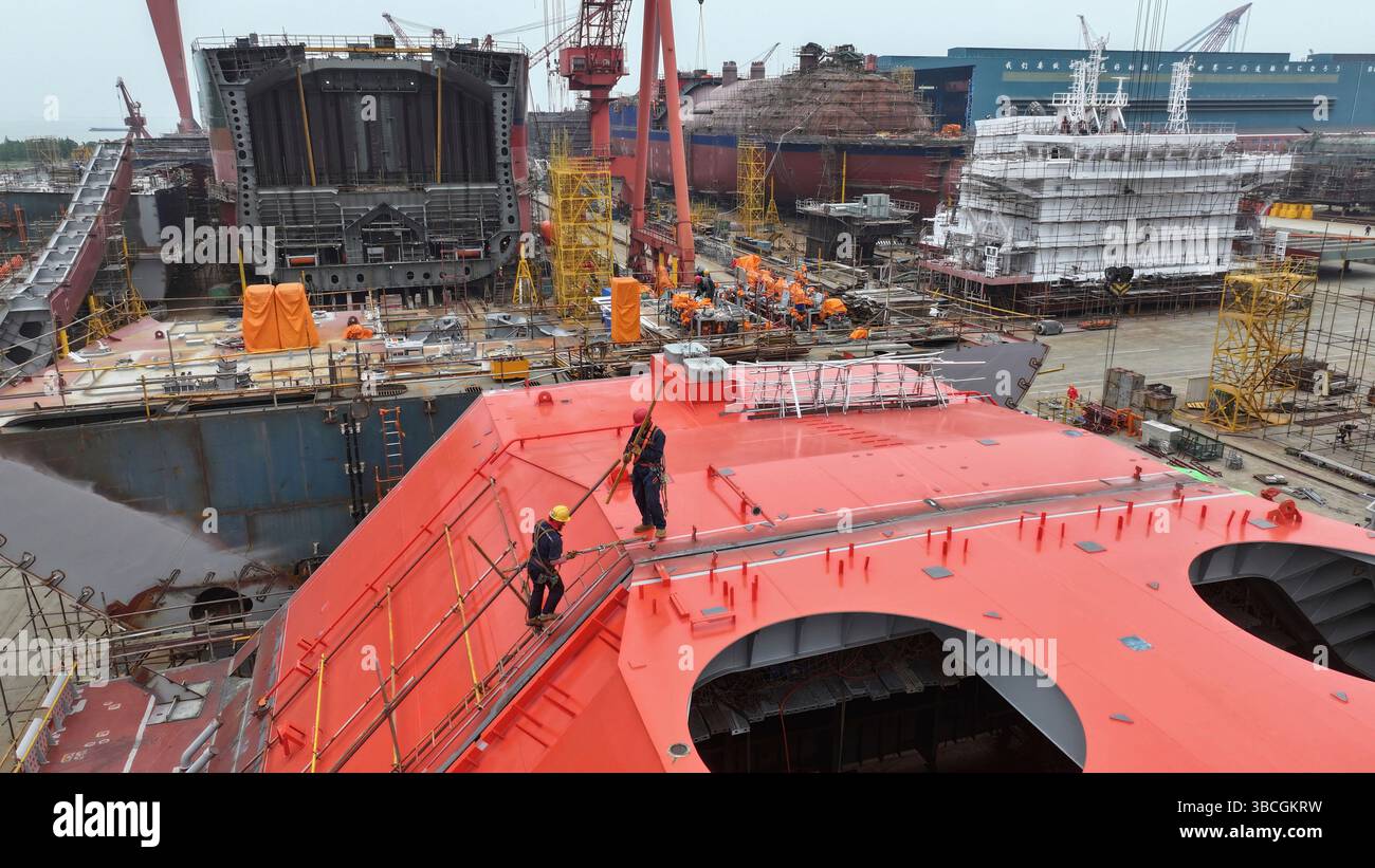 Parts of different ships are under construction at a shipyard in Taicang in east China's Jiangsu ...