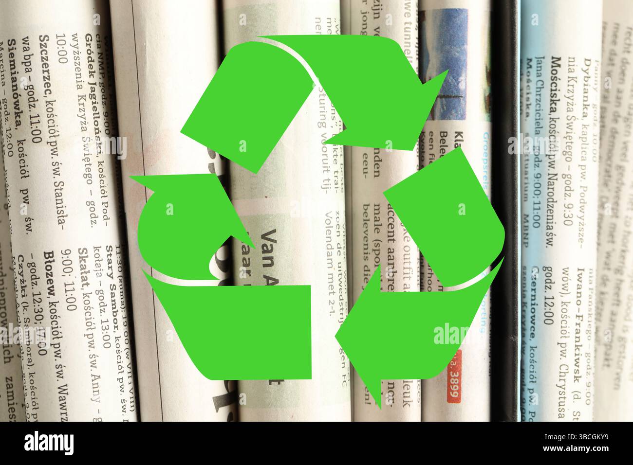 Recycling symbol and many newspapers in different languages as ...