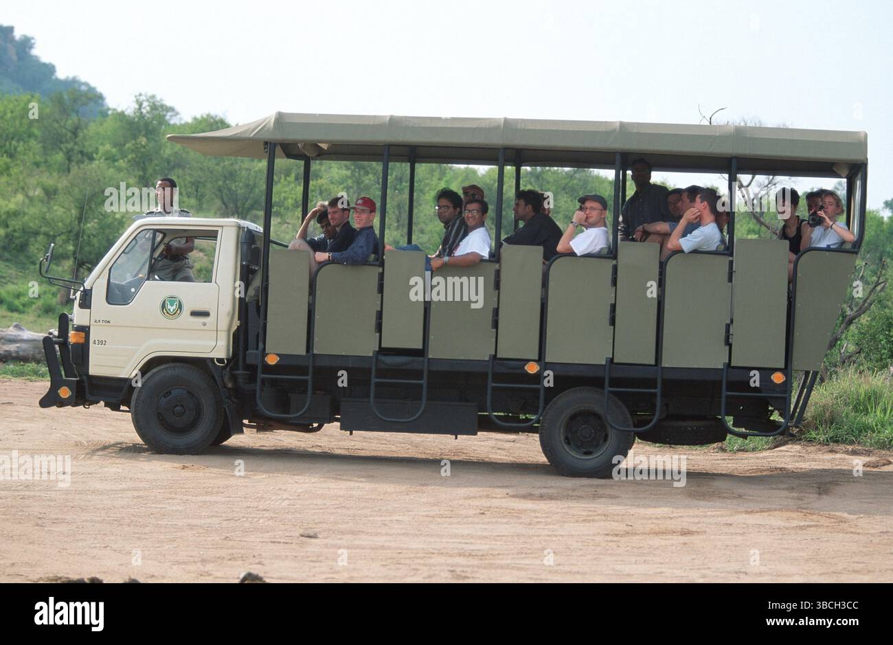 Tourists on a safari bus, Kruger National Park, South Africa Stock ...