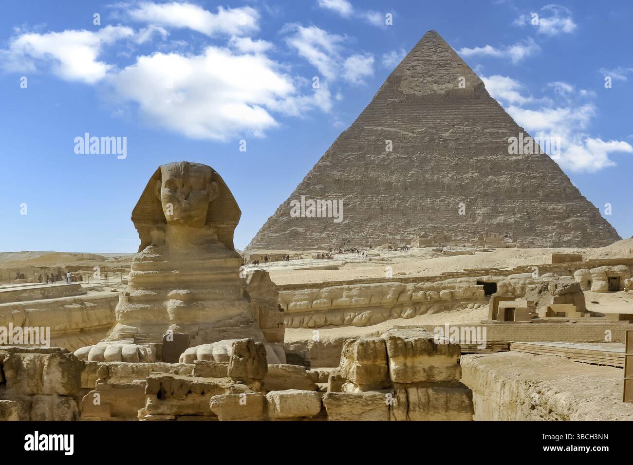 In front left Sphinx of Giza behind it Chephren Pyramid second highest ...