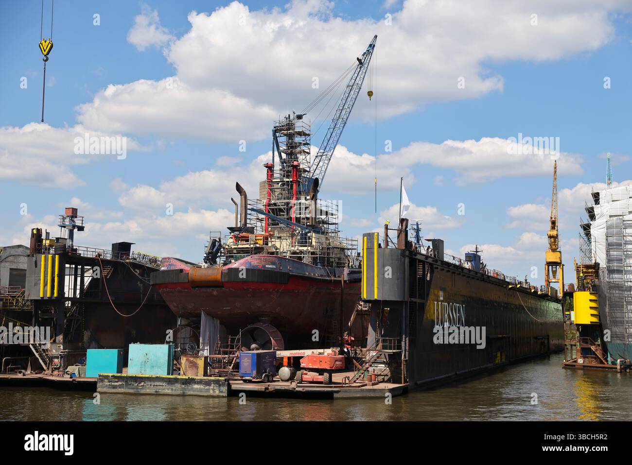 Hamburg, Germany. 20th May, 2025. A tugboat lies in dry dock at the ...
