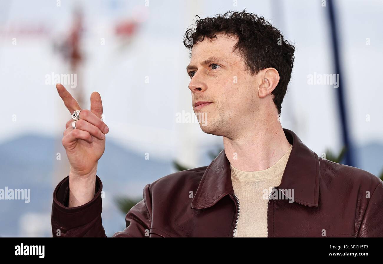 Cannes, France. 20th May, 2025. Actor Finnegan Oldfield poses during a ...