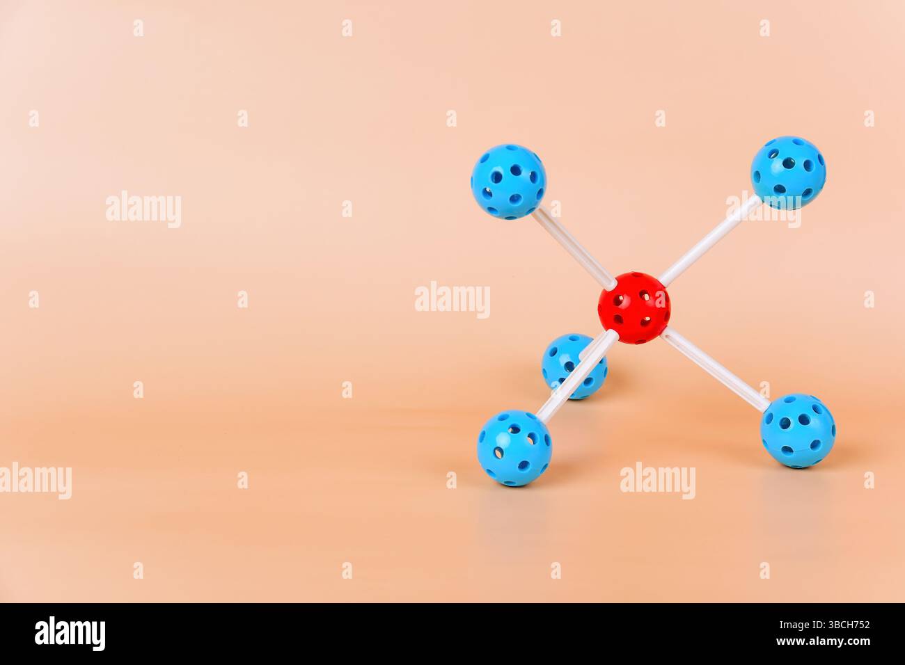 Plastic molecular model representing atoms connected by bonds is ...