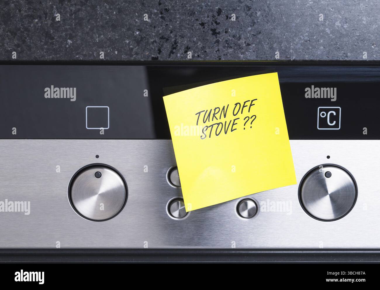 The photo shows a front panel of an electric cooker with a sign Stock ...