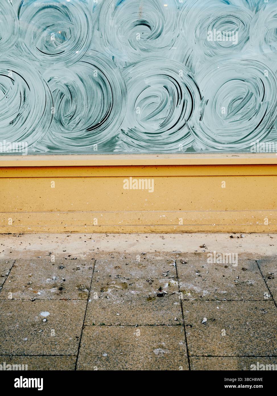 Empty closed high street shop window premises with whitewashed windows ...