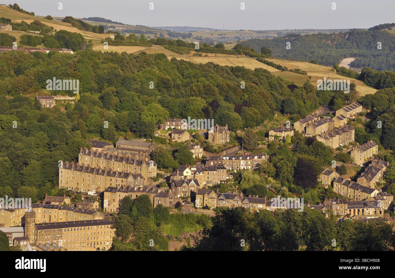 An aerial view of the town of hebden bridge in summer with hillside ...