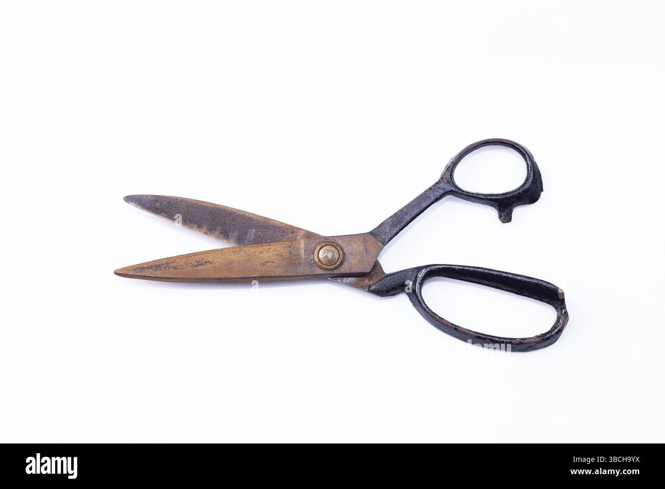 The photo shows an old rusty scissors on white background Stock Photo ...