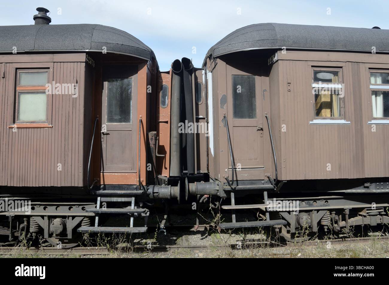 Vintage passenger railway cars sit on the tracks Stock Photo - Alamy