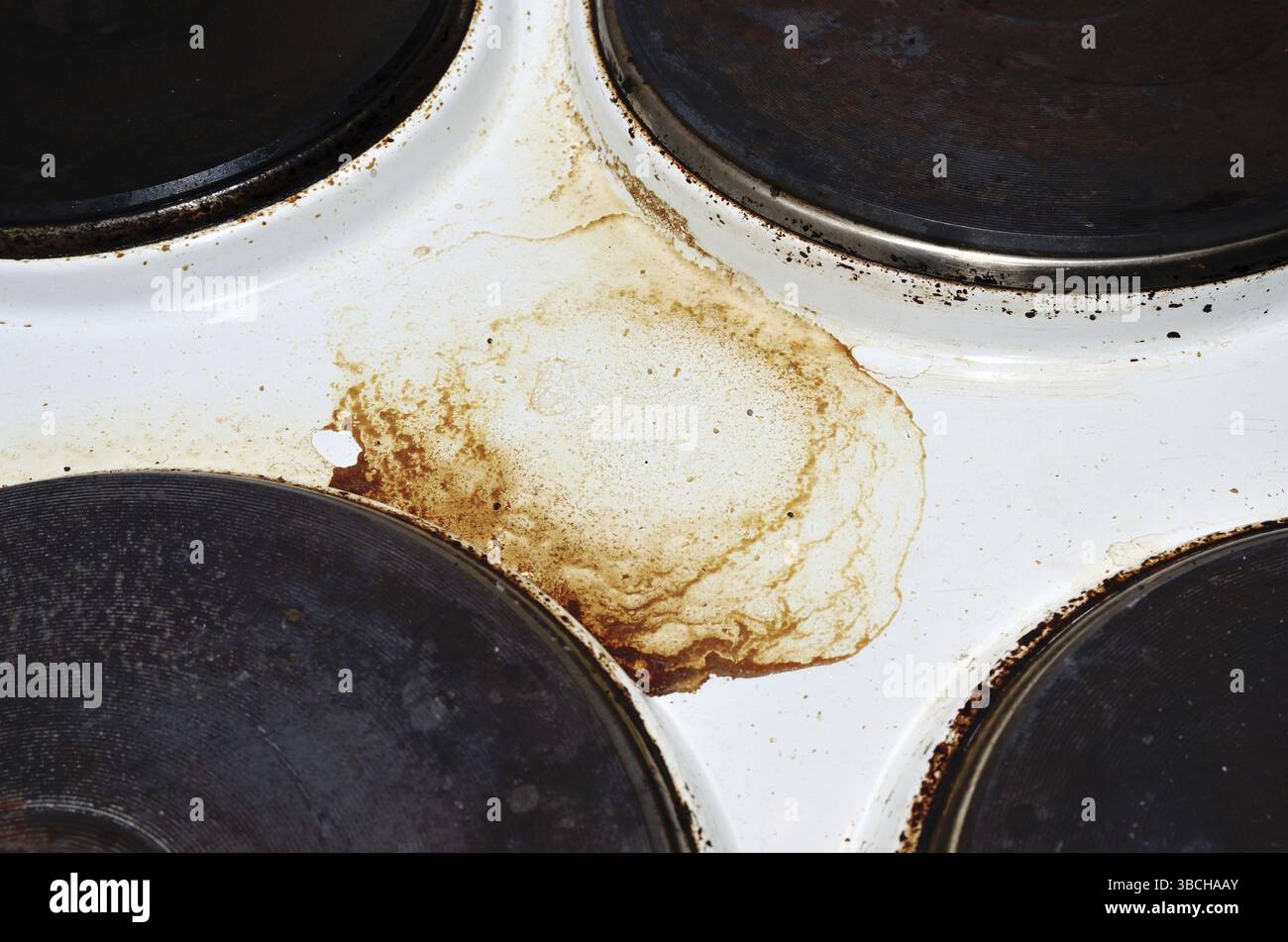 Old white enamelled dirty electric cooker, horizontal Stock Photo - Alamy