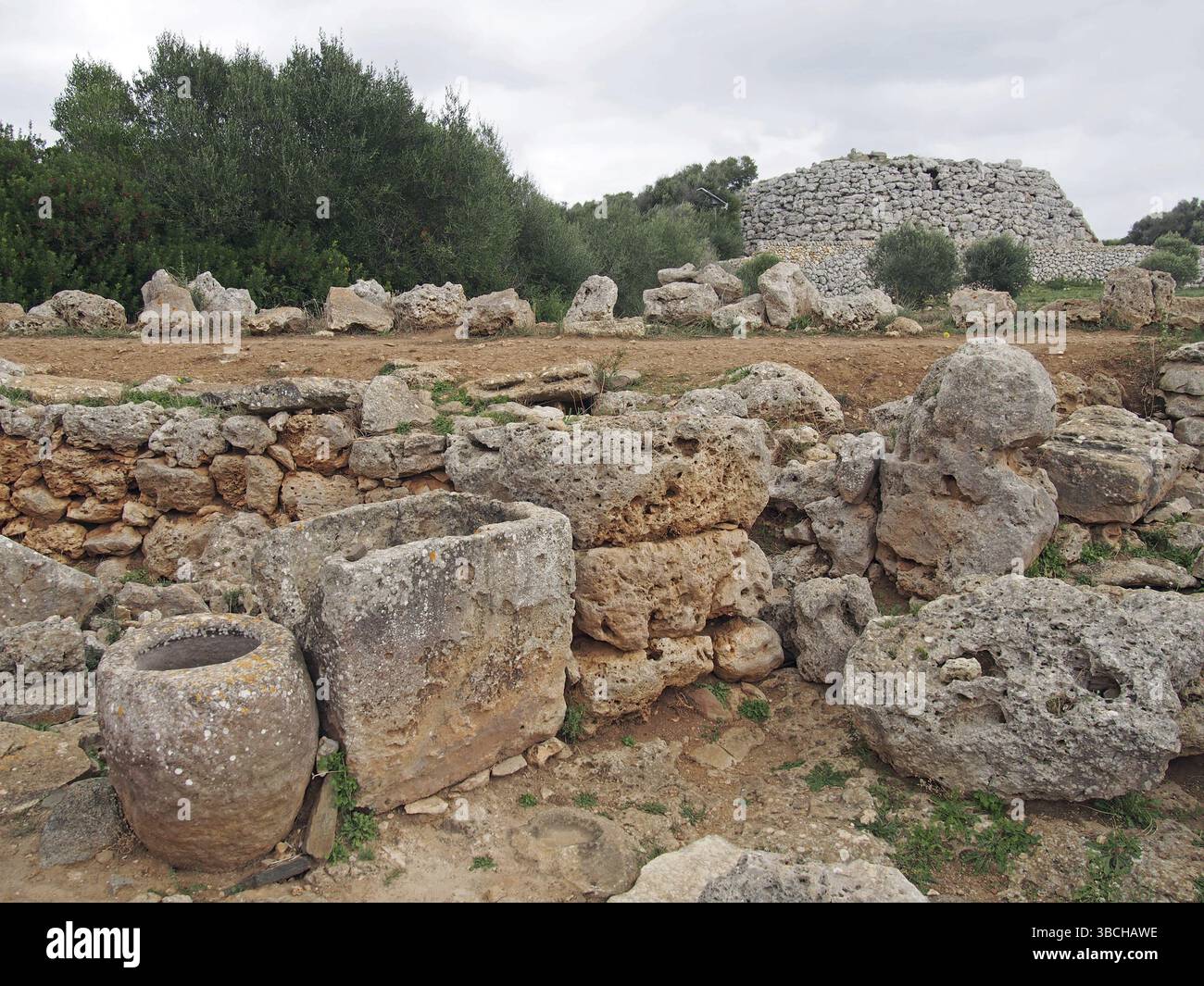 Ancient stone walls and ancient objects in trepuco minorca with talayot ...