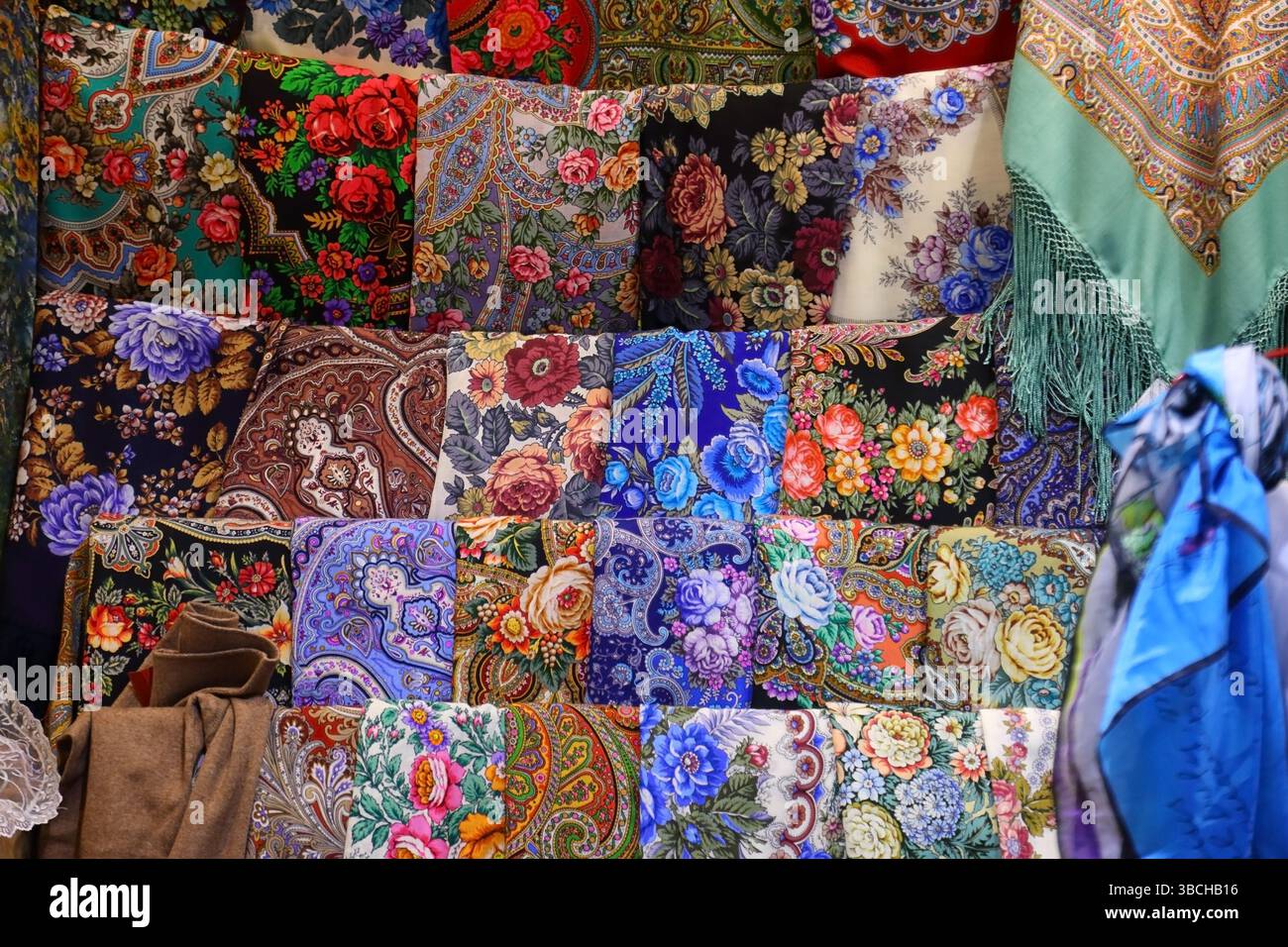 Full frame background of colored shawls painted in the traditional ...