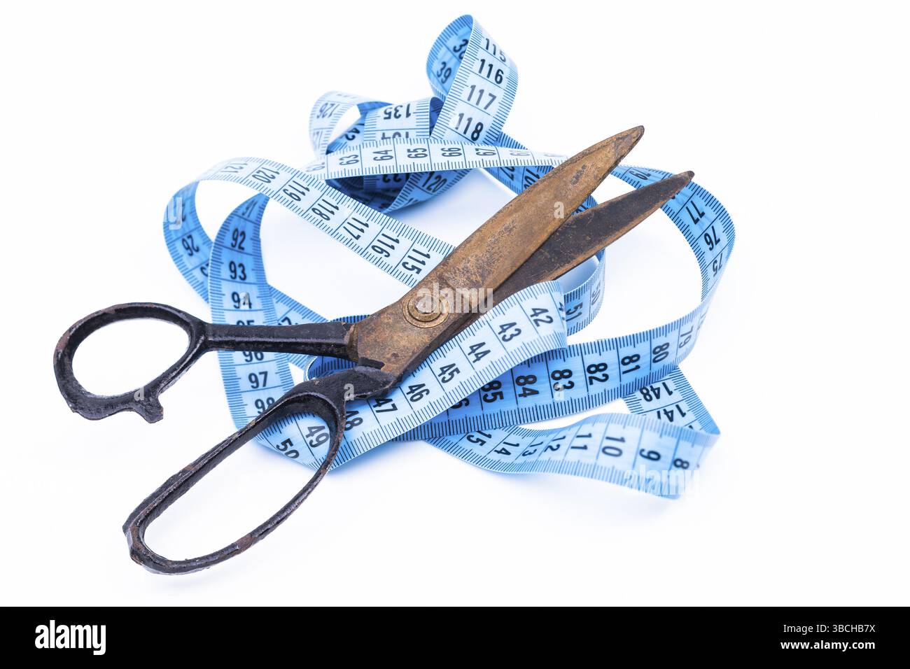 The photo shows a pair of rusty scissors and a tape measure Stock Photo ...