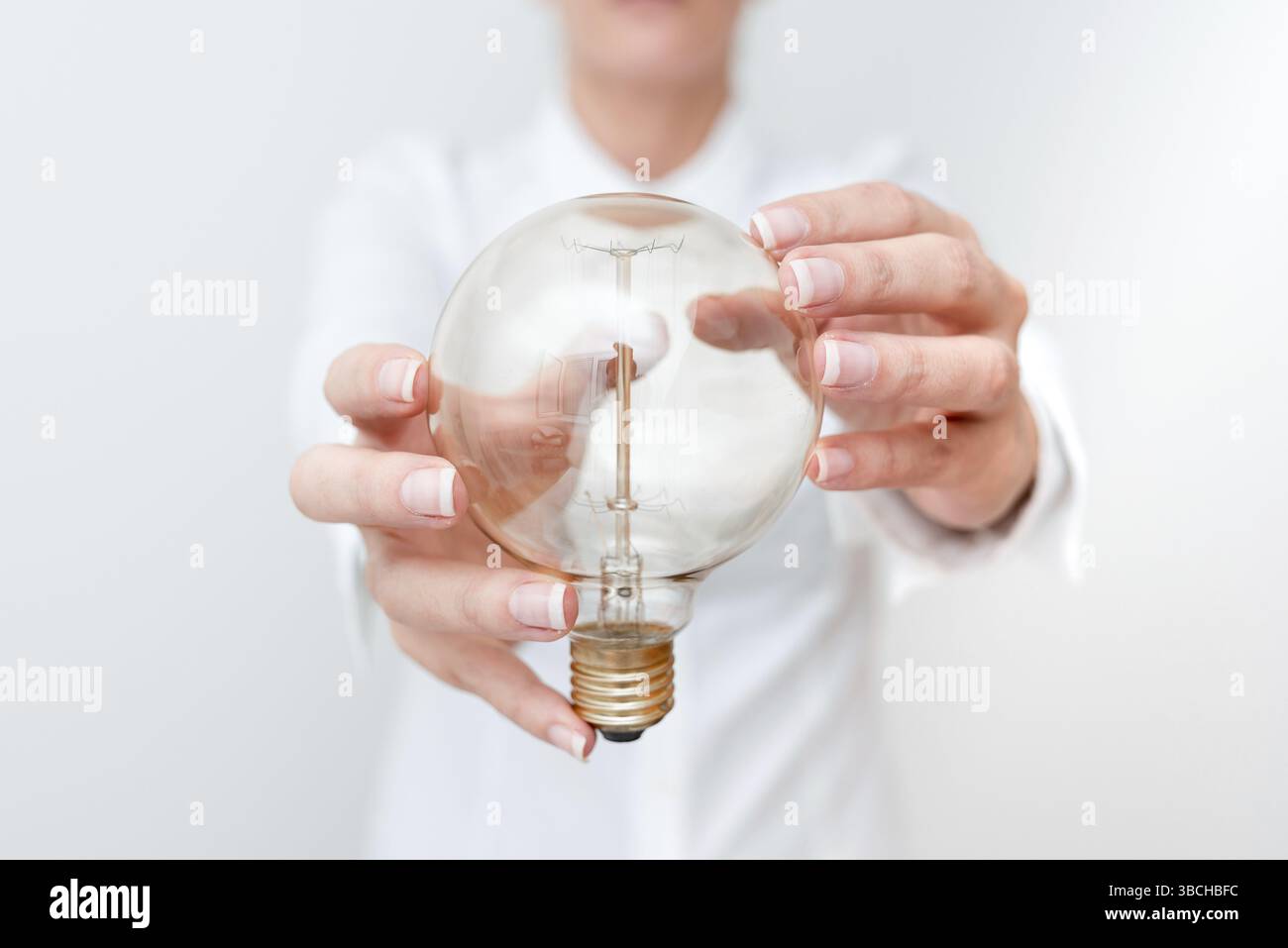 Lady Holding Lamp With Formal Outfit Presenting New Ideas For Project ...