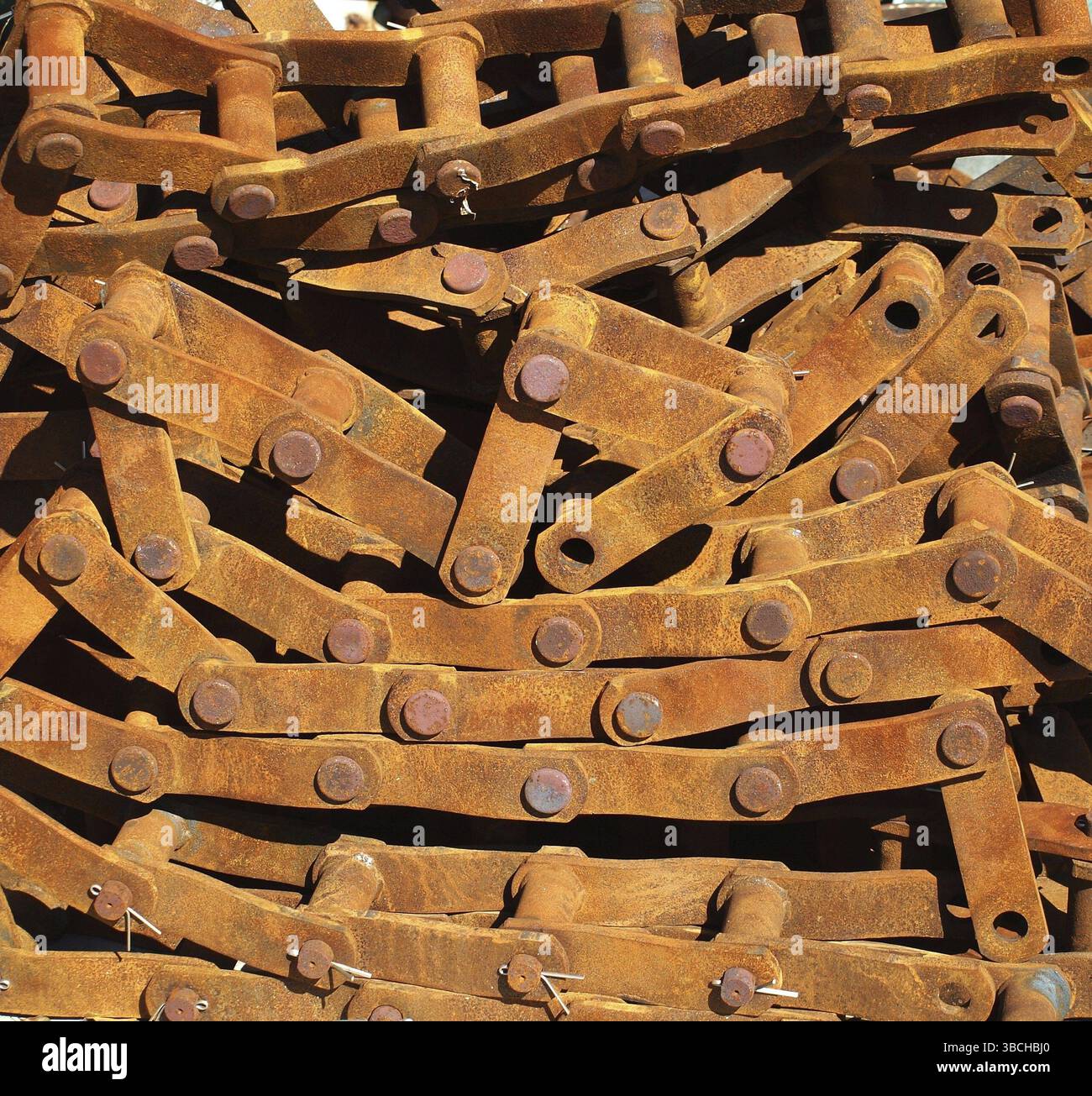 A rusty old chain link system that was part of a continuous track Stock ...