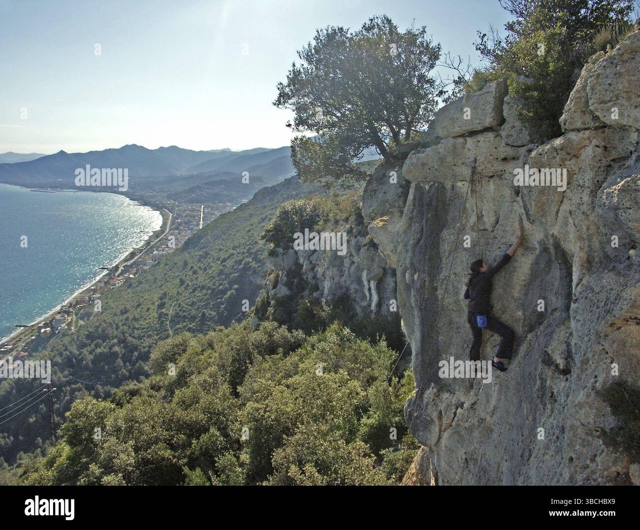 Climbing with a sea view, Finale Ligure Stock Photo - Alamy