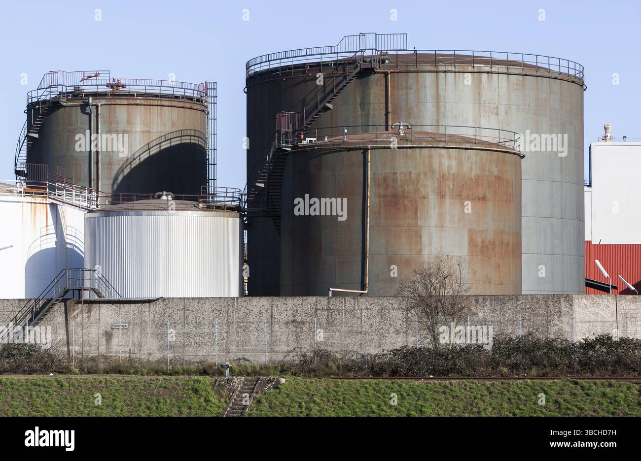 Image shows an buildup with fuel storage tanks Stock Photo - Alamy