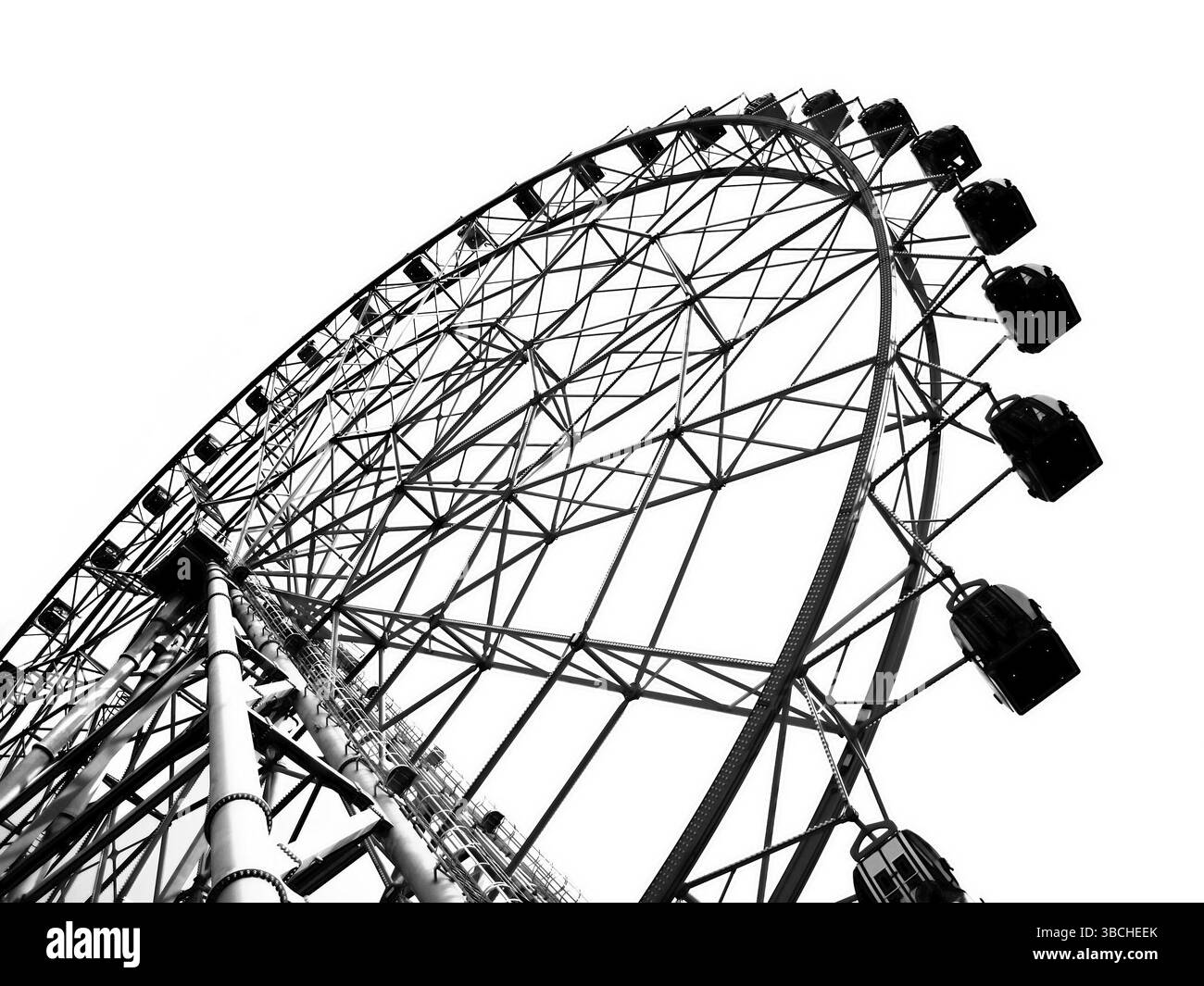A ferris wheel at a local fun fair seen in silhouette Stock Photo - Alamy